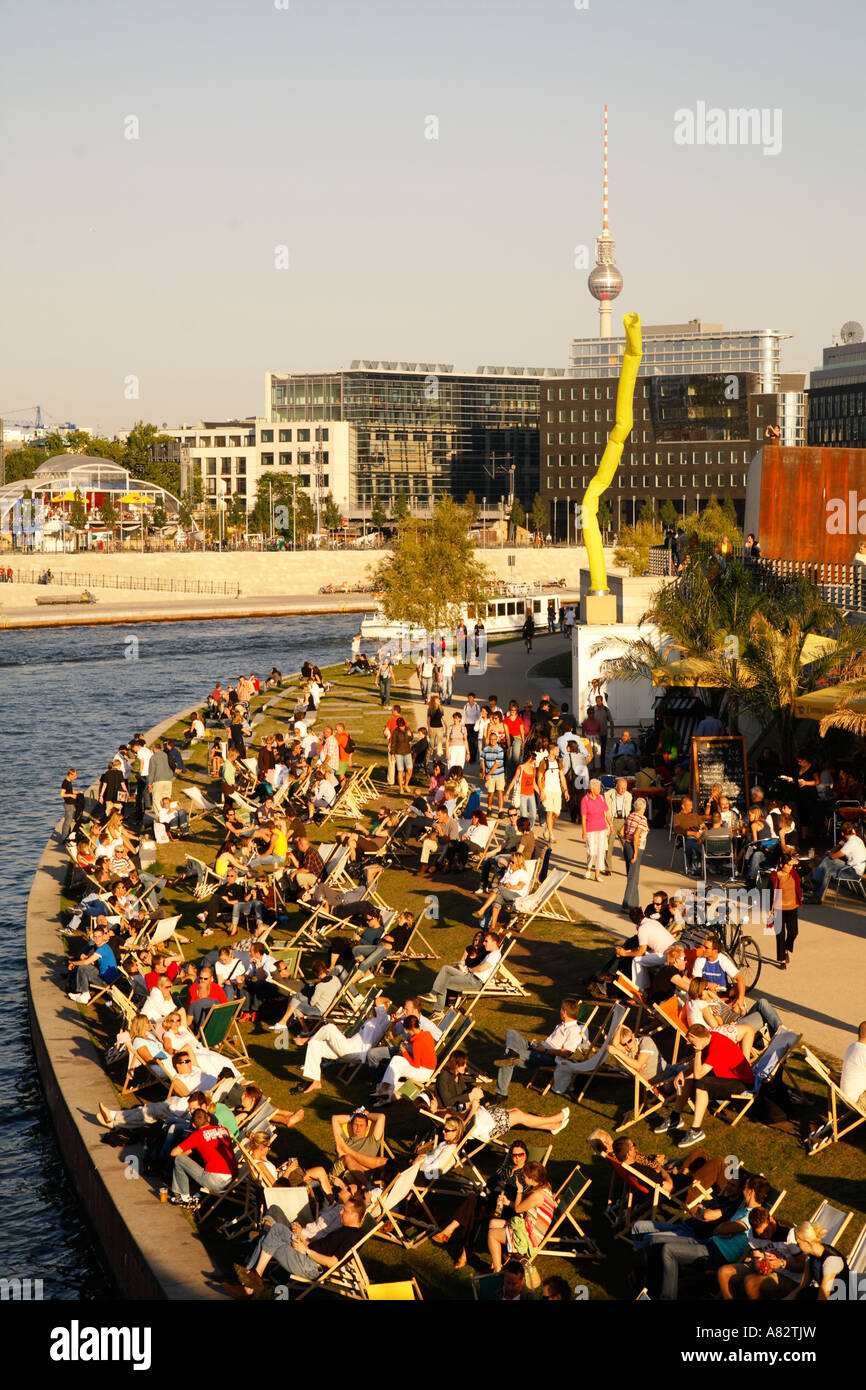 Berlin capital beach near Lehrter main station riverbank Spree people ...