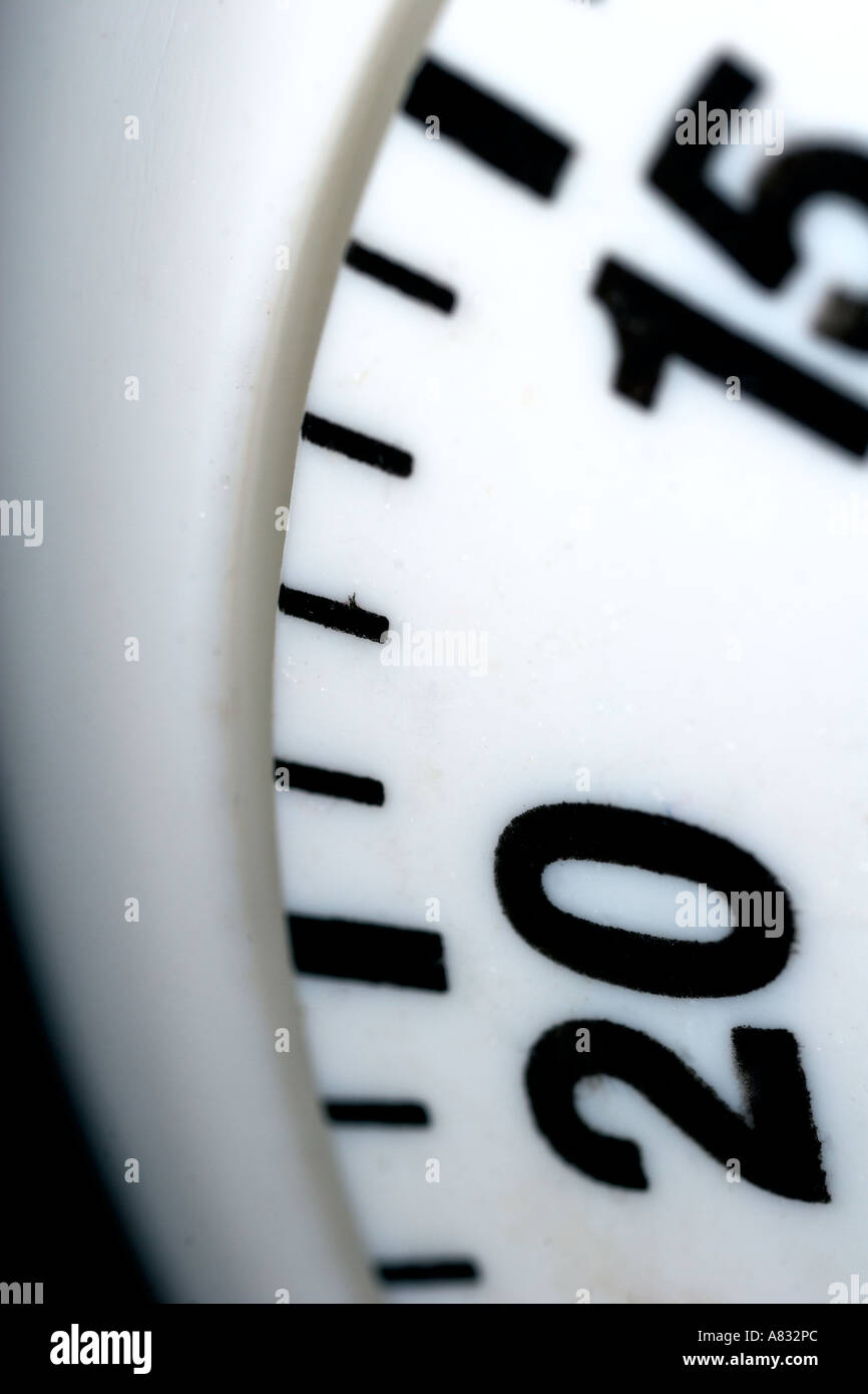 Black and white rotary kitchen timer with the number 20 and 15 showing ...