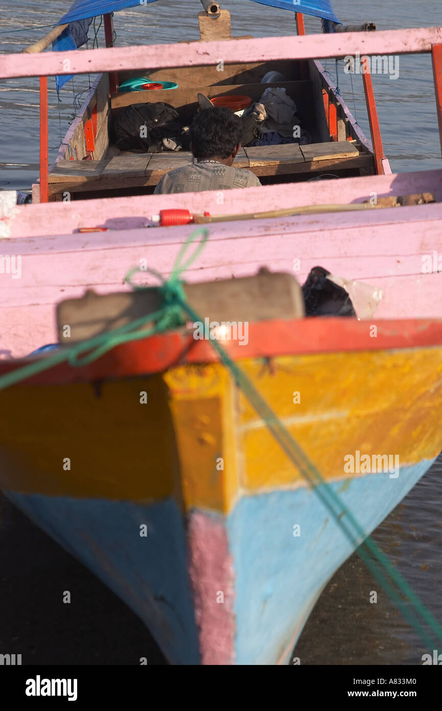 Man Fixing Boat Stock Photo - Alamy