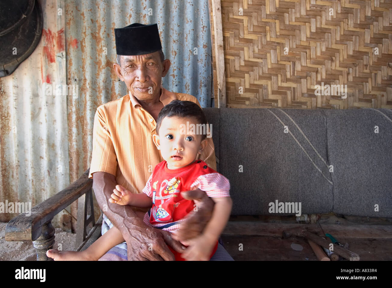Old Man Holding Child Stock Photo - Alamy