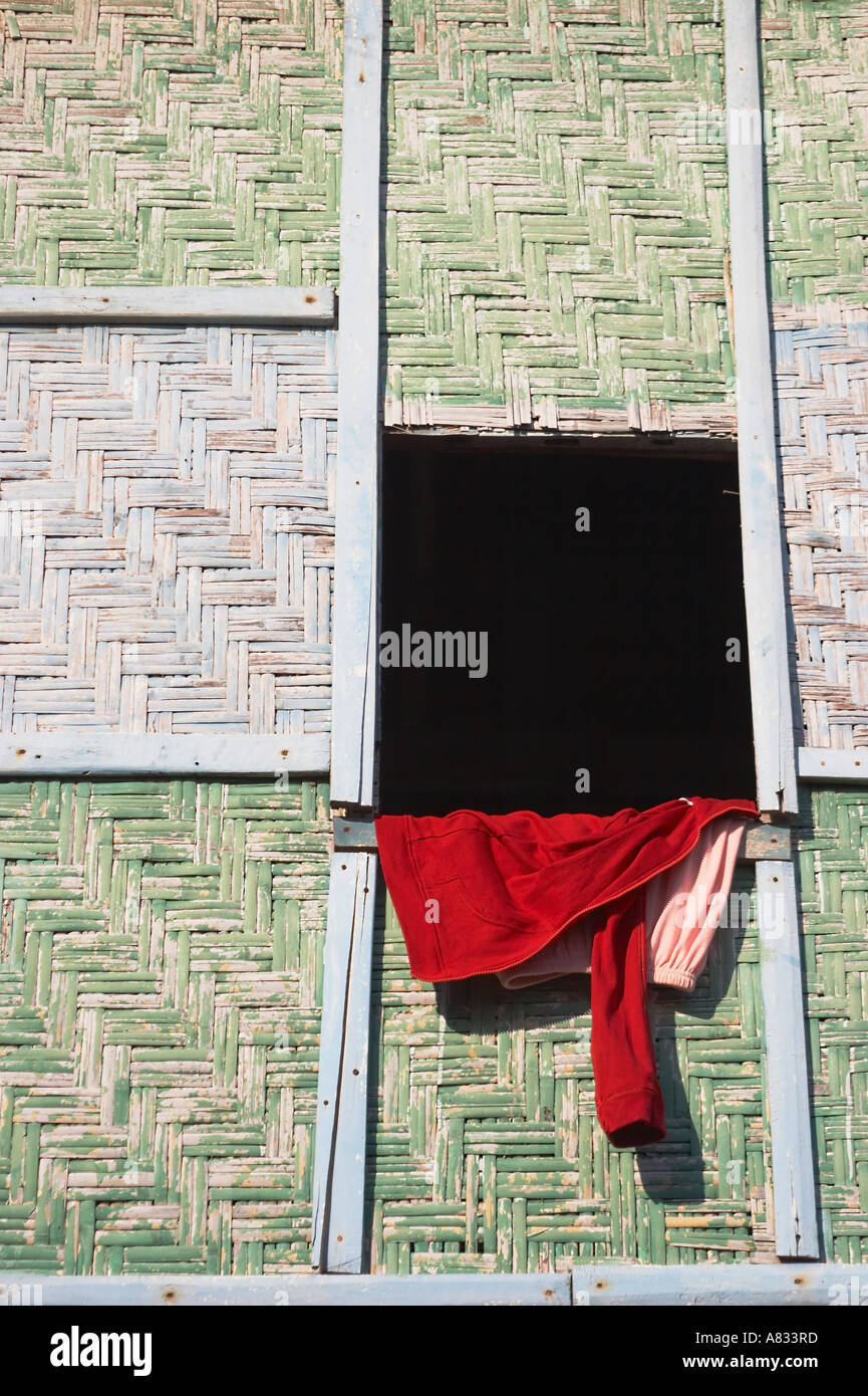 Clothes Hanging Out Window Of House Stock Photo - Alamy