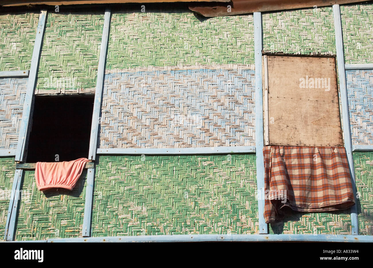 Clothes Hanging Out Window Of House Stock Photo - Alamy