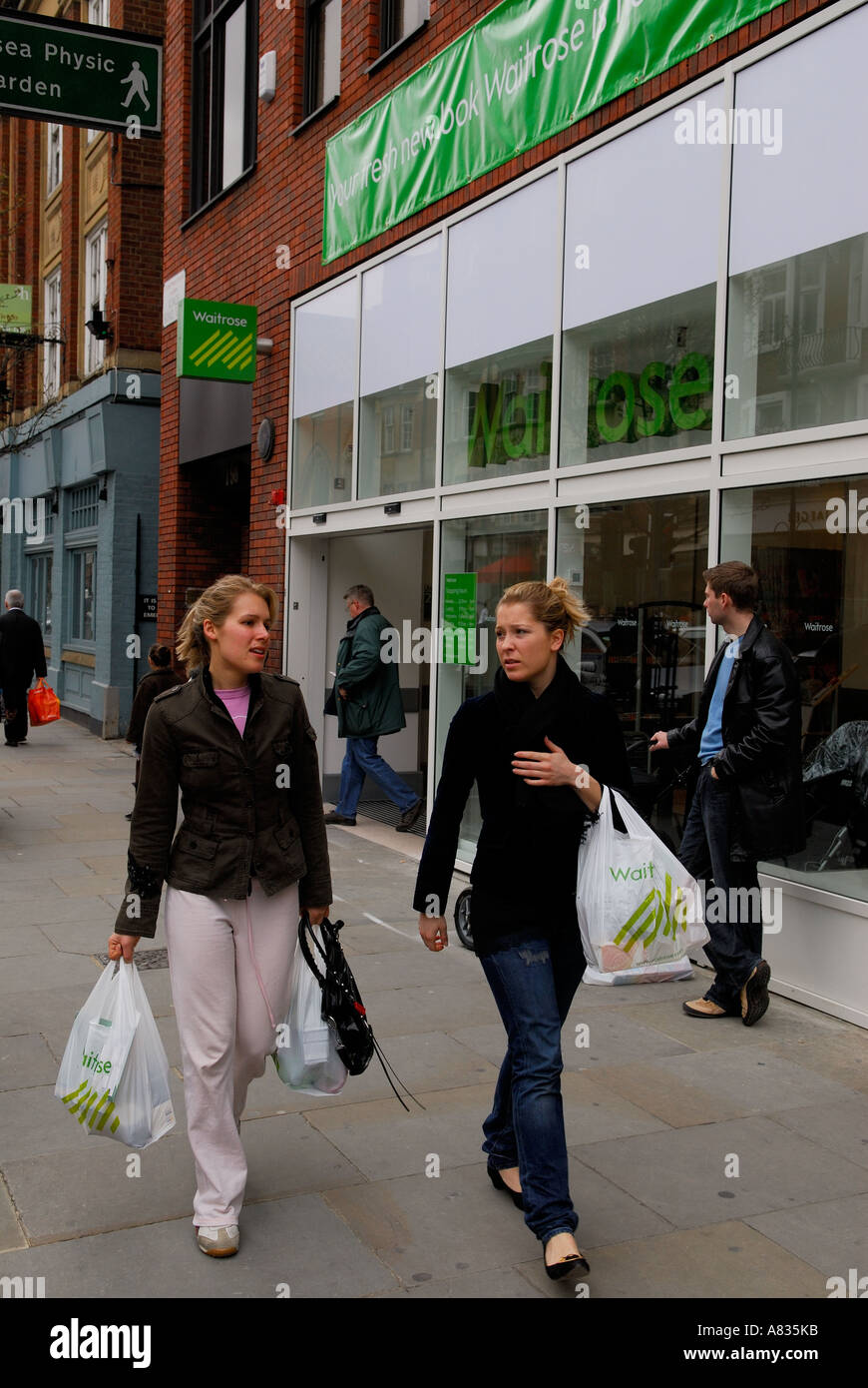 Plastic Waitrose shopping bags. Young women grocery buying Kings Road ...