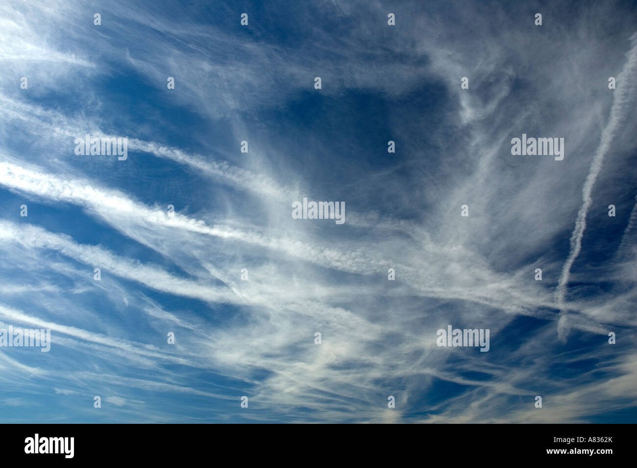 Wispy cloud trails hi-res stock photography and images - Alamy