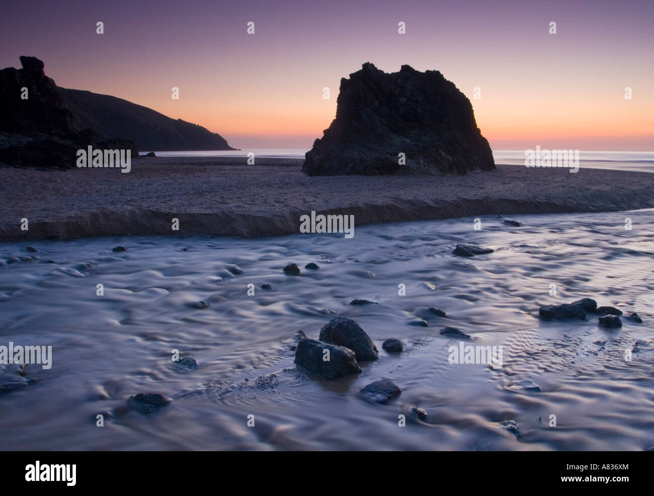 The river flowing down the beach at Holywell Bay Cornwall UK Stock ...