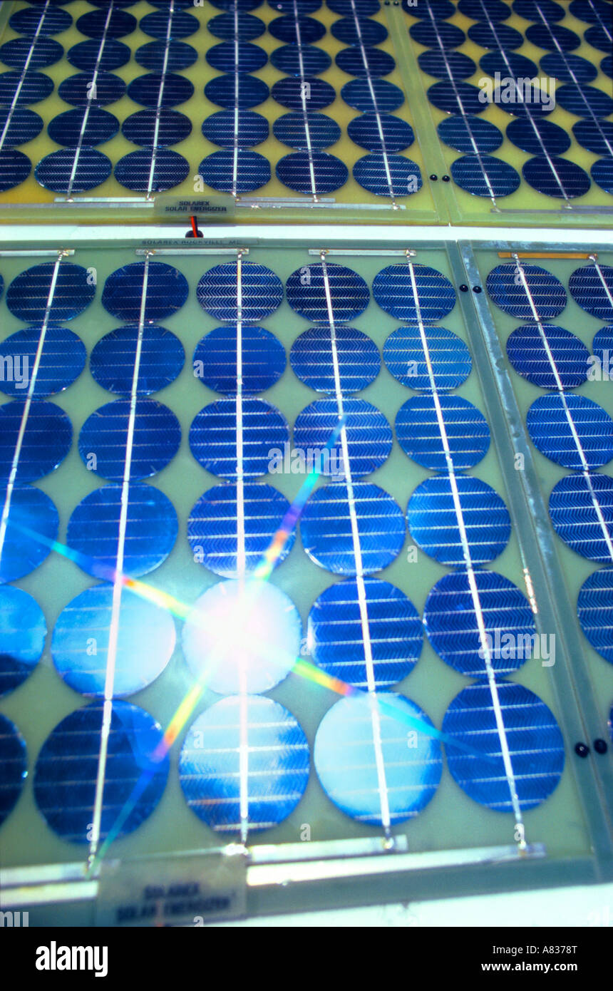 Arrays of solar cells interconnected in modular panels react to the sun ...