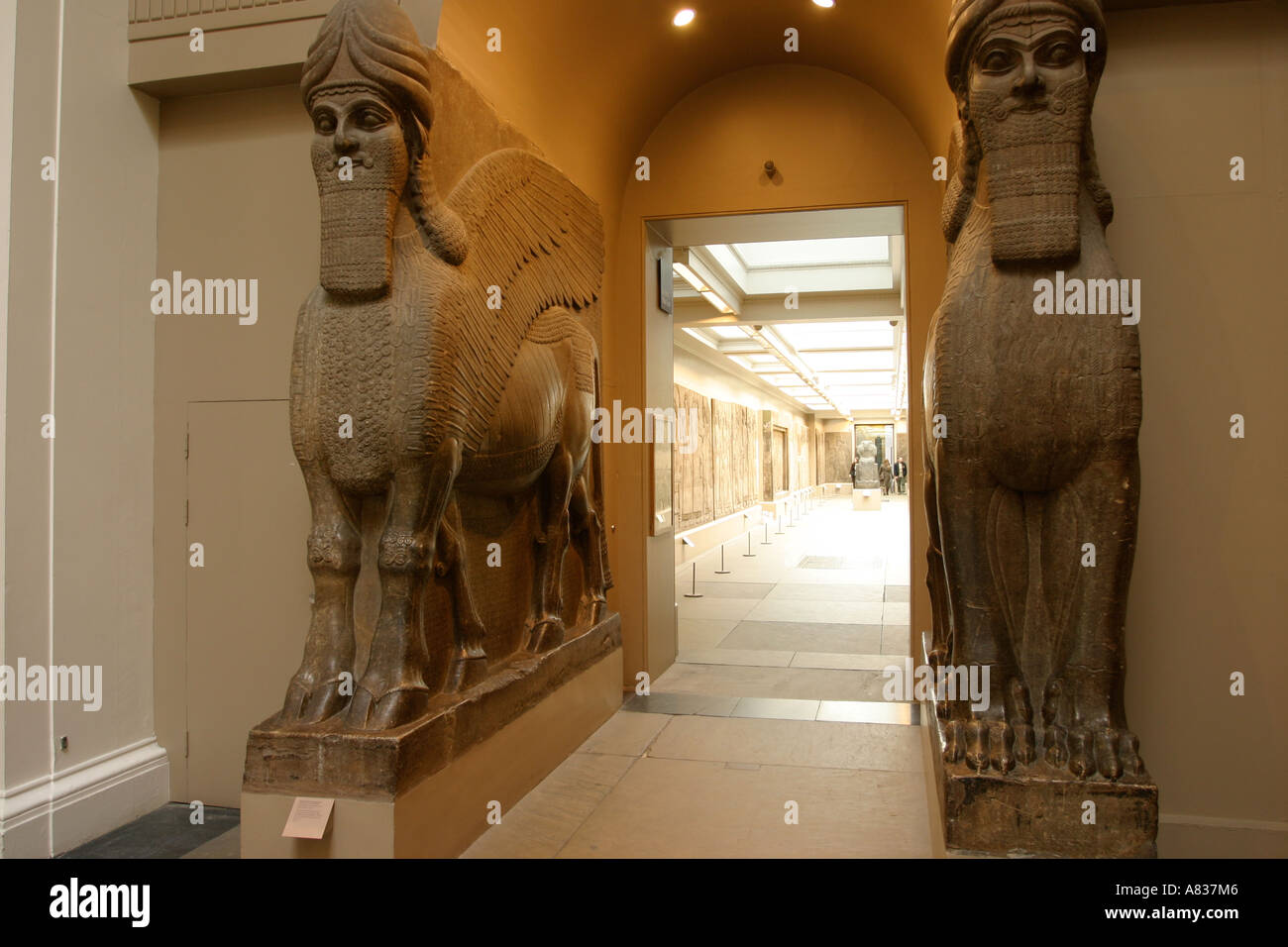 Large Assyrian stone sculptures of mythological guardian figures now in ...