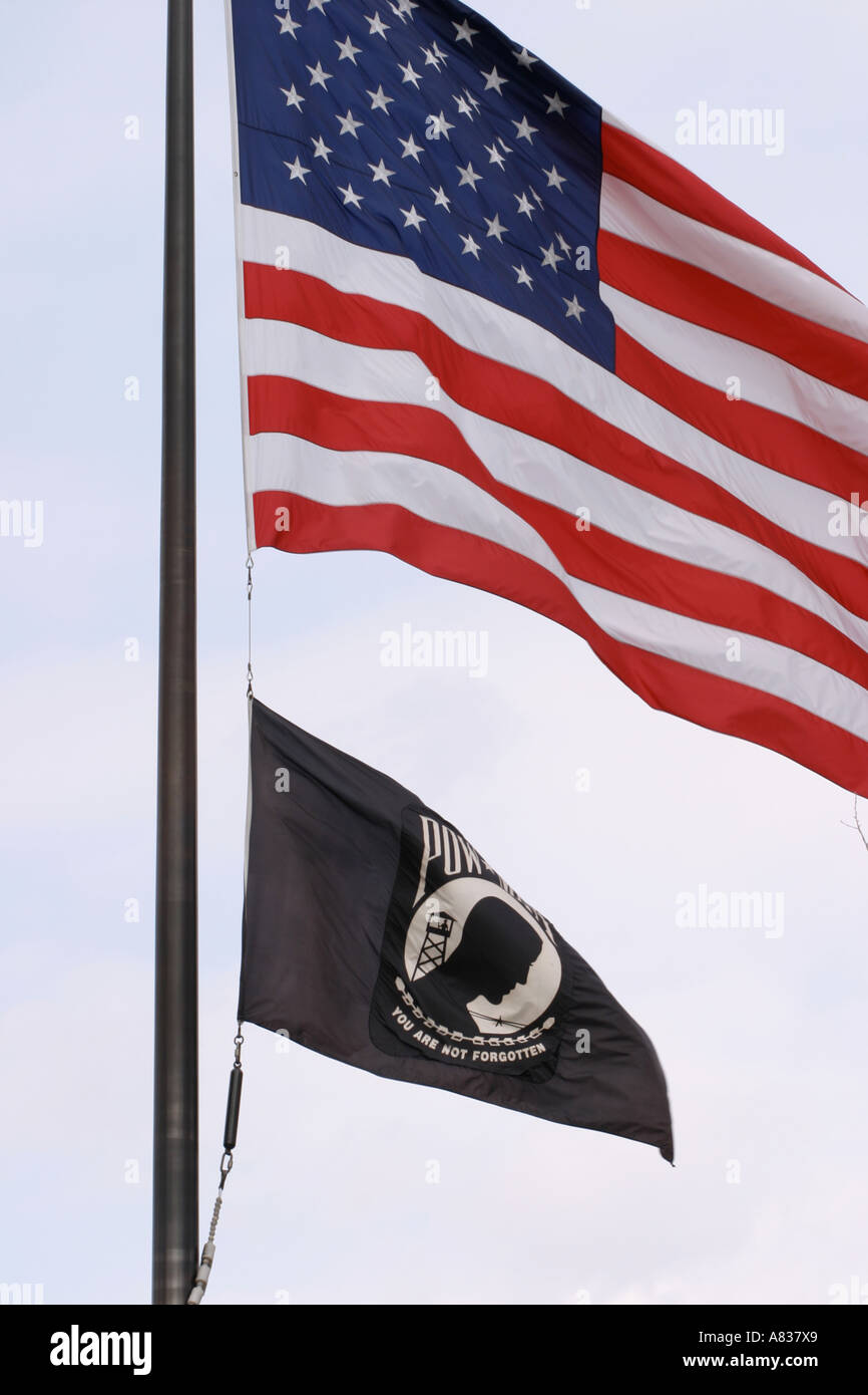 The Stars and Stripes flies with the flag for soldiers missing in ...