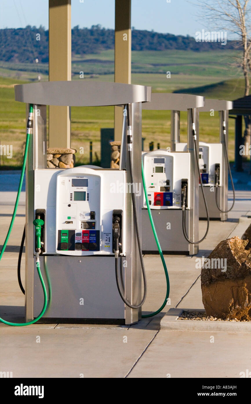 Solar panels and gas pumps contrast old and new energy technologies ...
