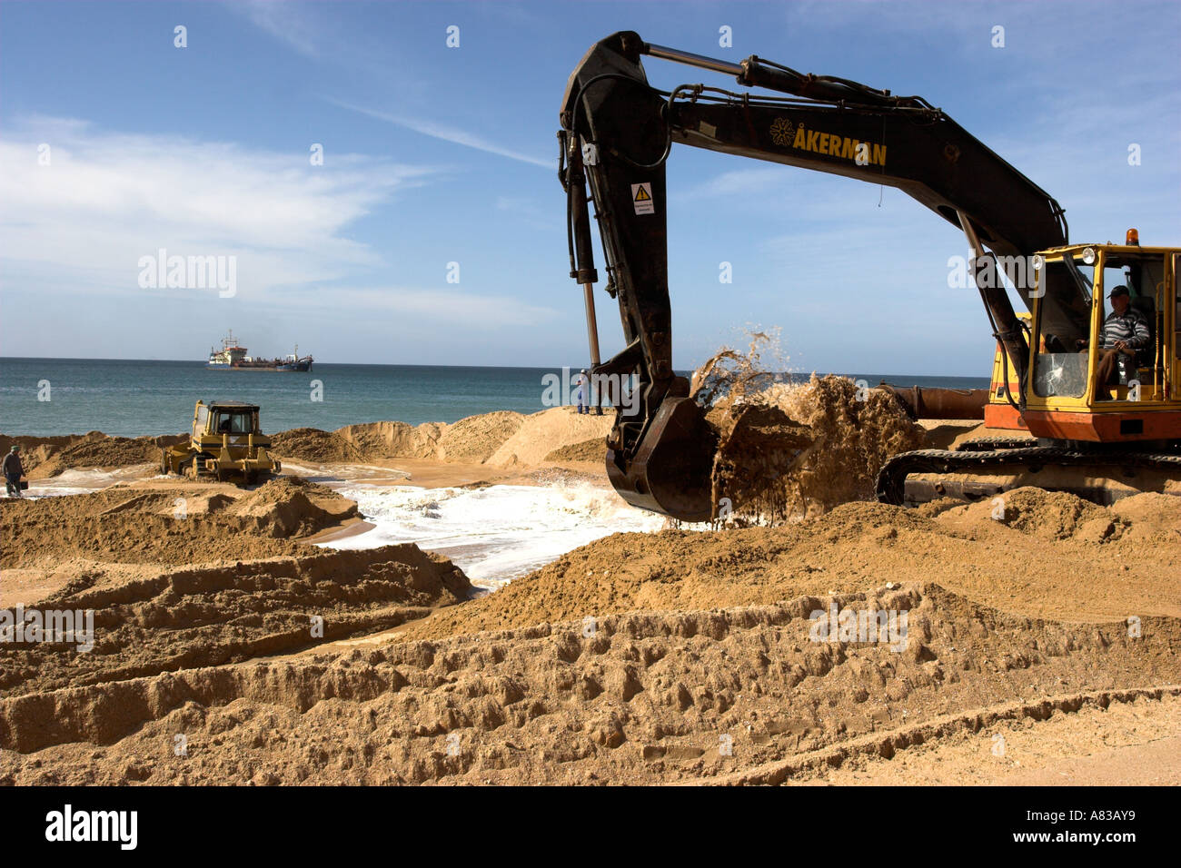 Refurbishment of a beach with fresh sand pumped from the seabed to ...