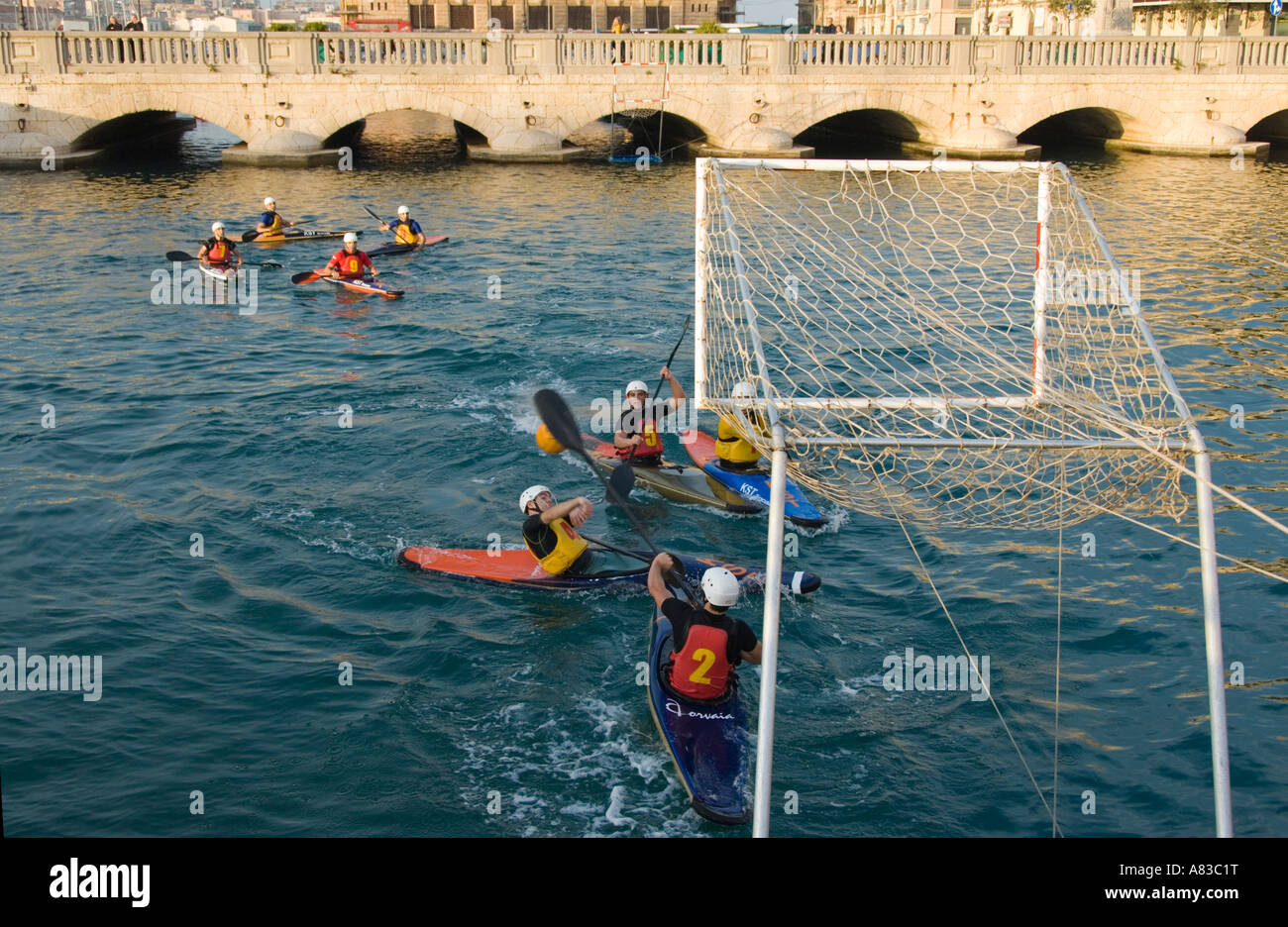 Canoe polo game in action Stock Photo - Alamy