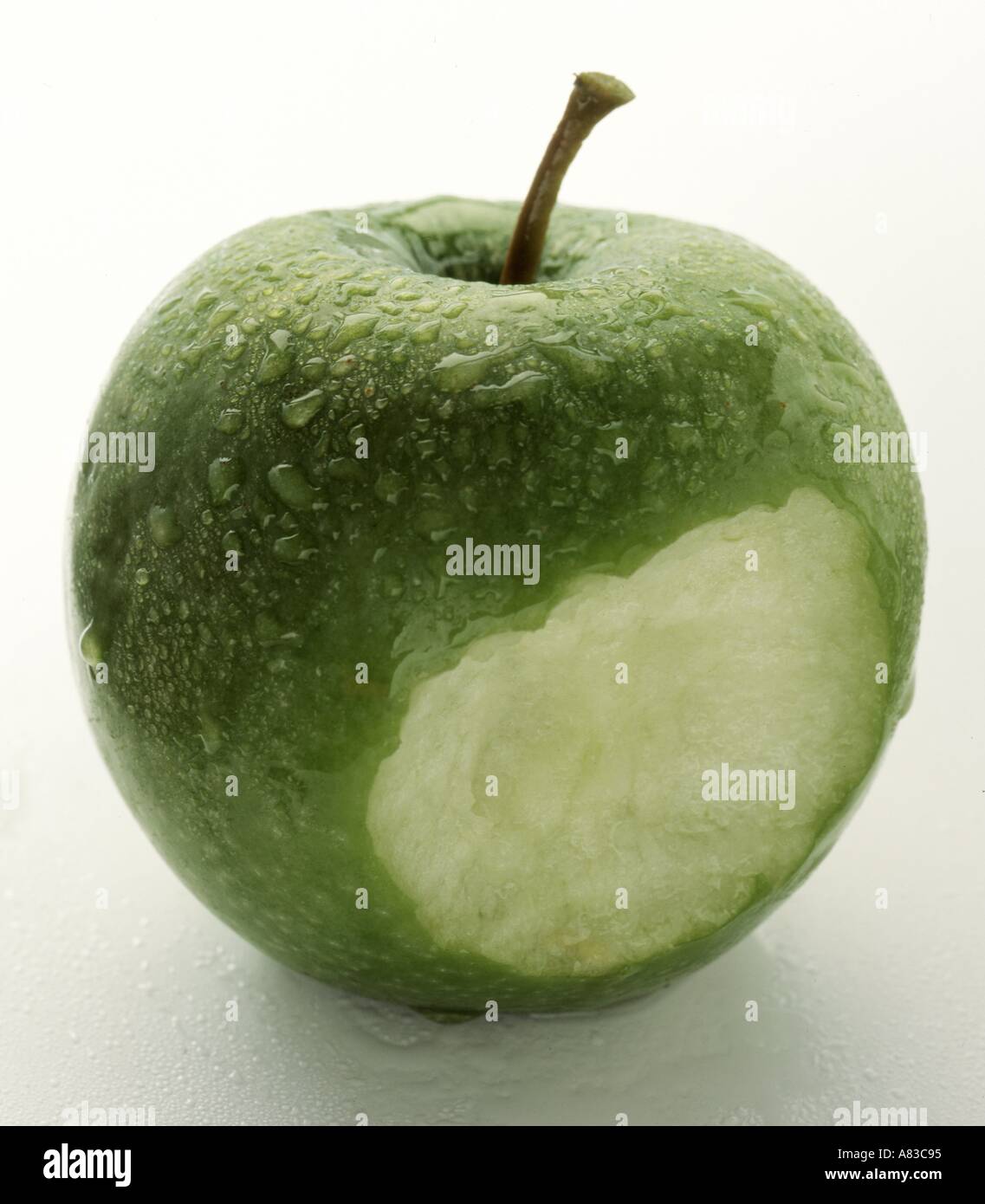 A Bitten Granny Smith Apple Stock Photo - Alamy