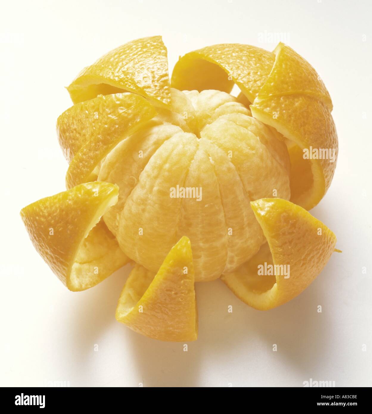A Peeled Orange with Peel Stock Photo - Alamy