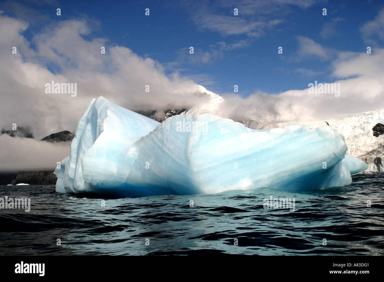 Exquisitely beautiful turquoise blue color of an Antarctic sculptural ...