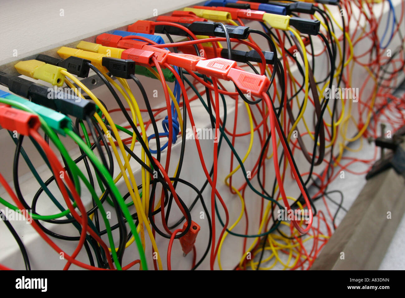 coloured electrical leads in physics laboratory in sixth 6th form ...