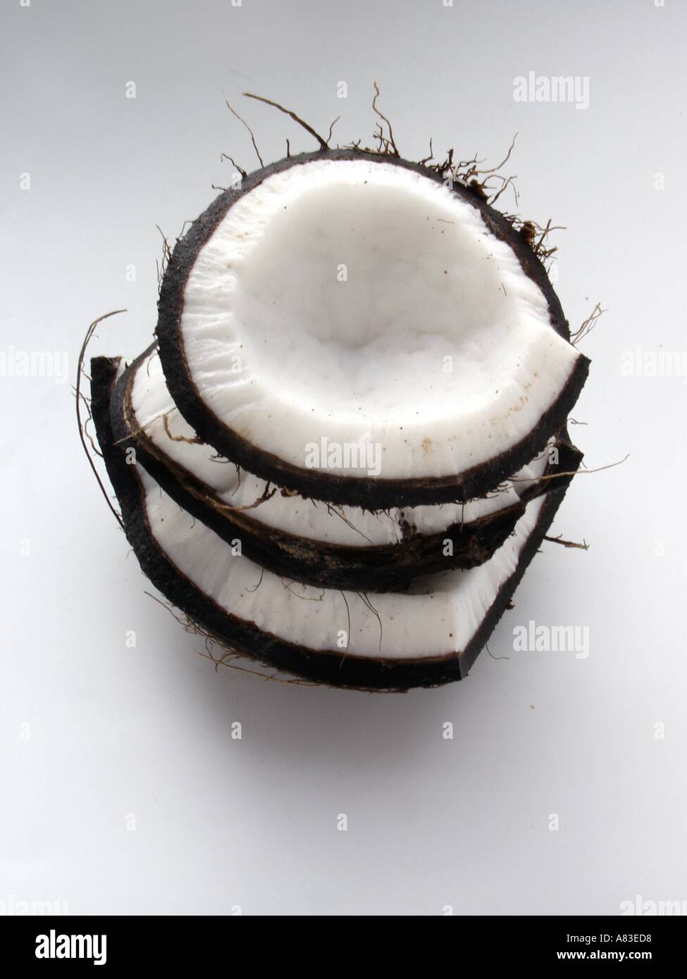 A Stack of Sliced Coconut Stock Photo - Alamy