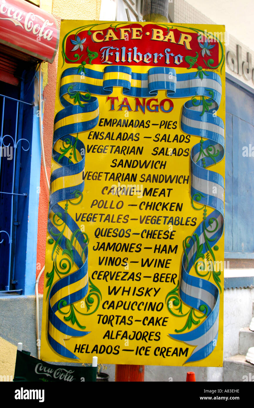 typical vivdly painted cafe Tango sign and menu in Caminito, La Boca ...