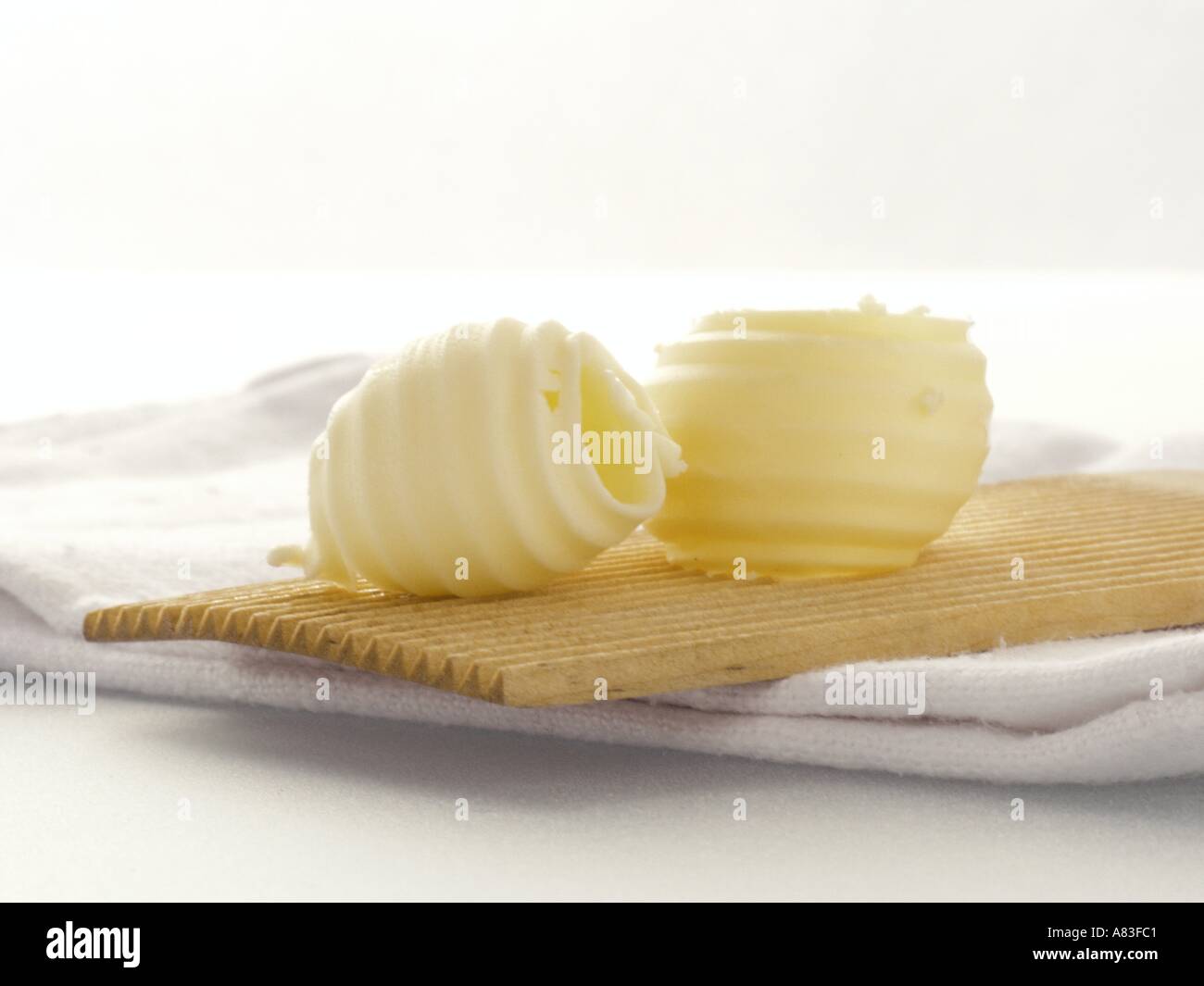Two Butter Curls Stock Photo - Alamy
