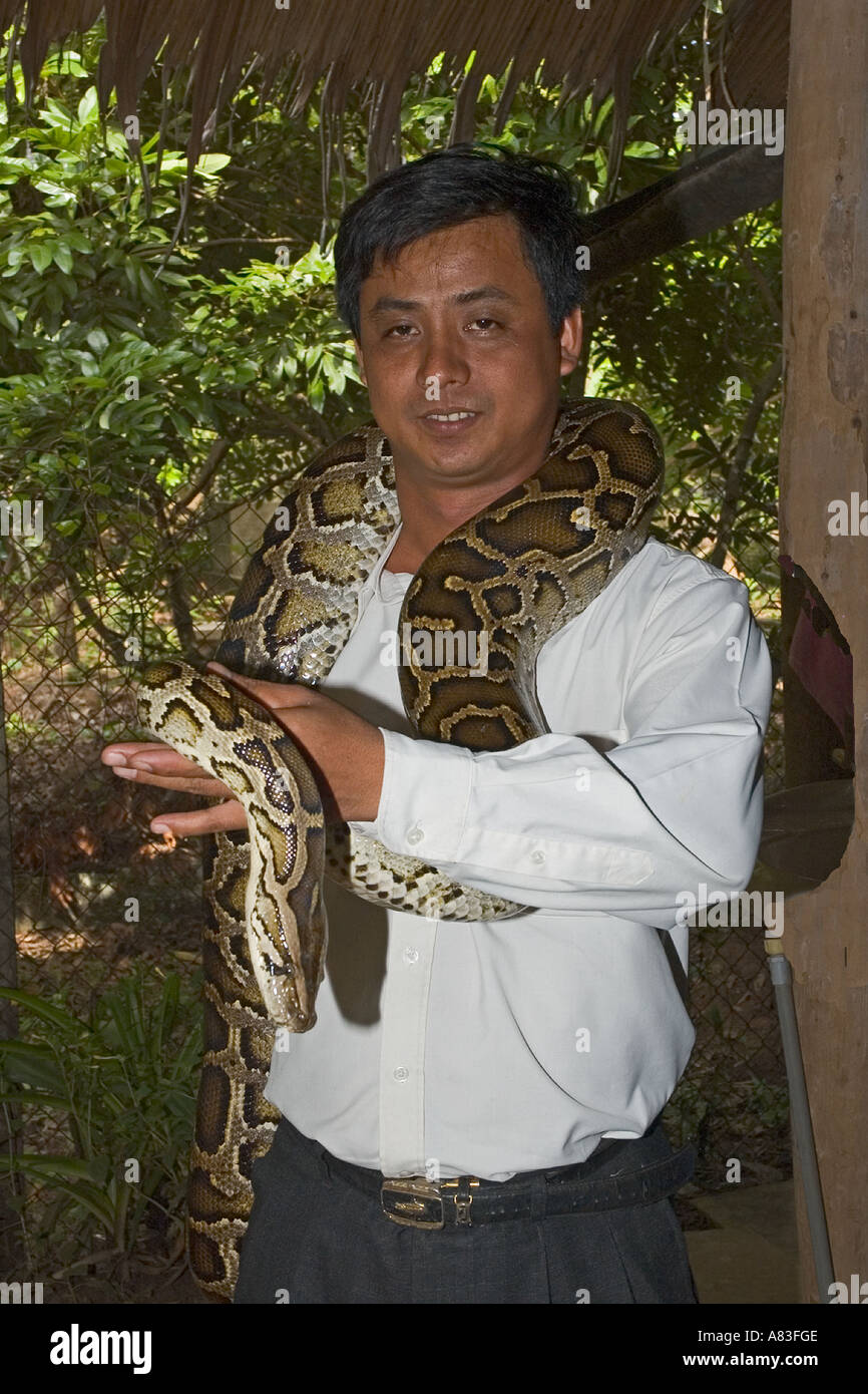 VIETNAM Phoenix Island man with python around his body Asia Stock Photo ...