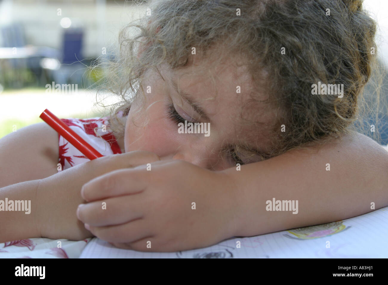Little girl writing a secret letter Stock Photo - Alamy