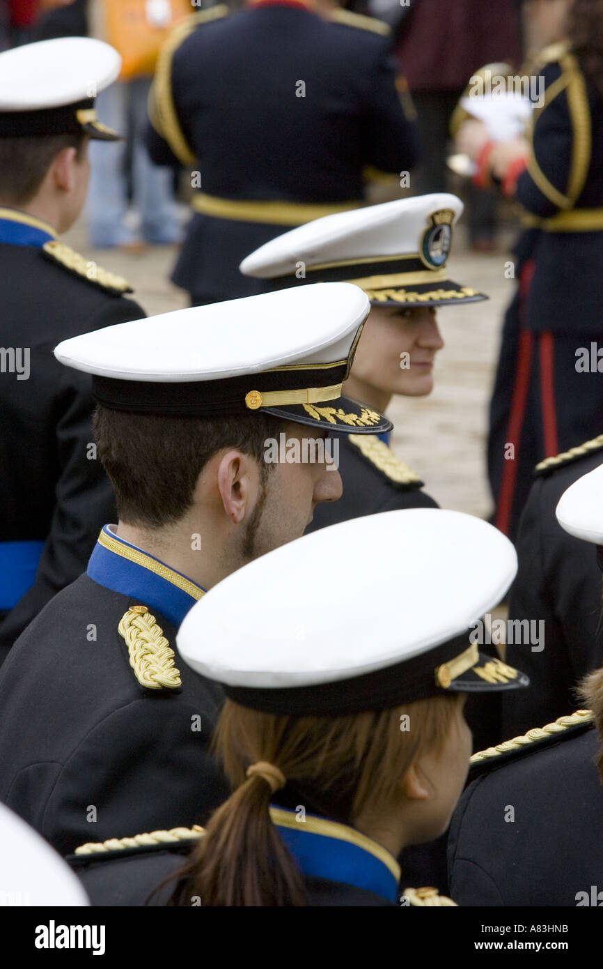 Band members in uniform wearing white military style hats in Plaza ...