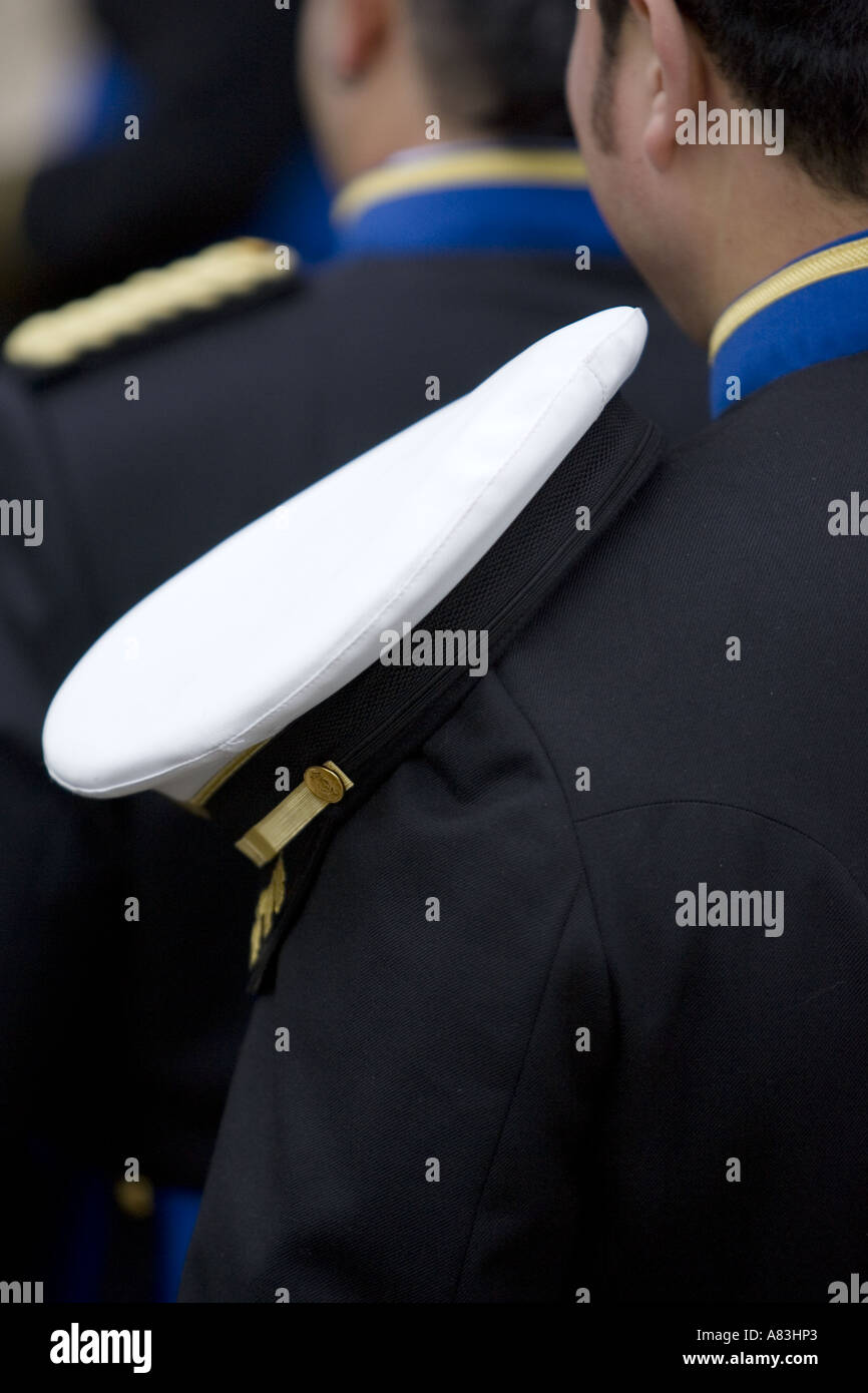 Band member in uniform with white military hat on shoulder in Plaza ...