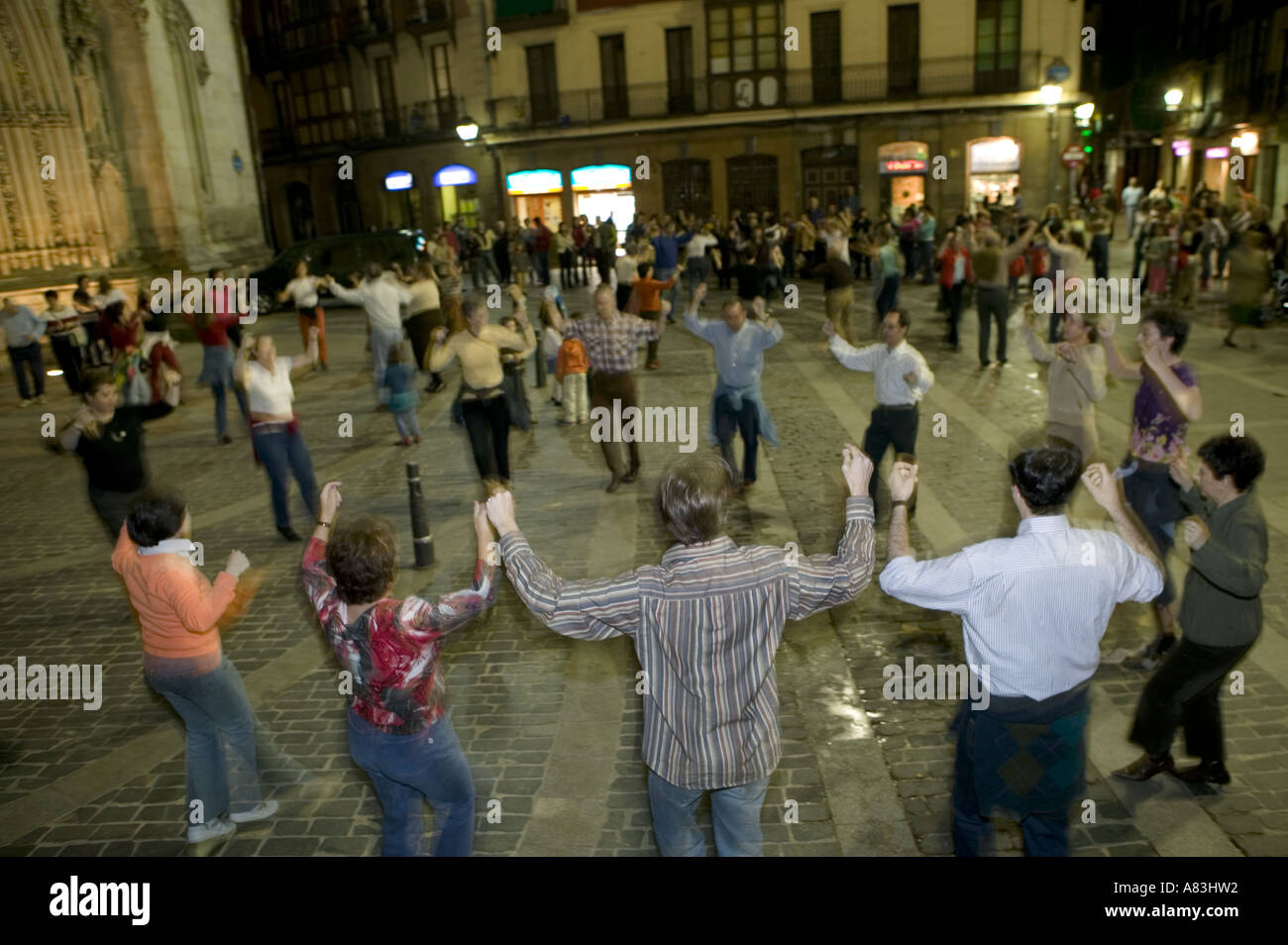People perform Basque folk dances in the evening in Plaza Santiago ...