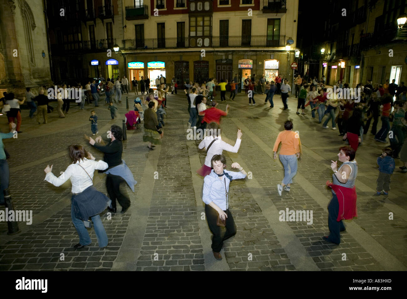 People perform Basque folk dances in the evening in Plaza Santiago ...
