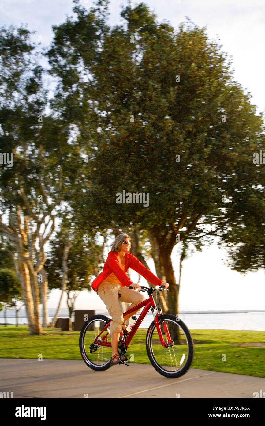 A visitor riding a bike along San Diego Bay Chula Vista California ...