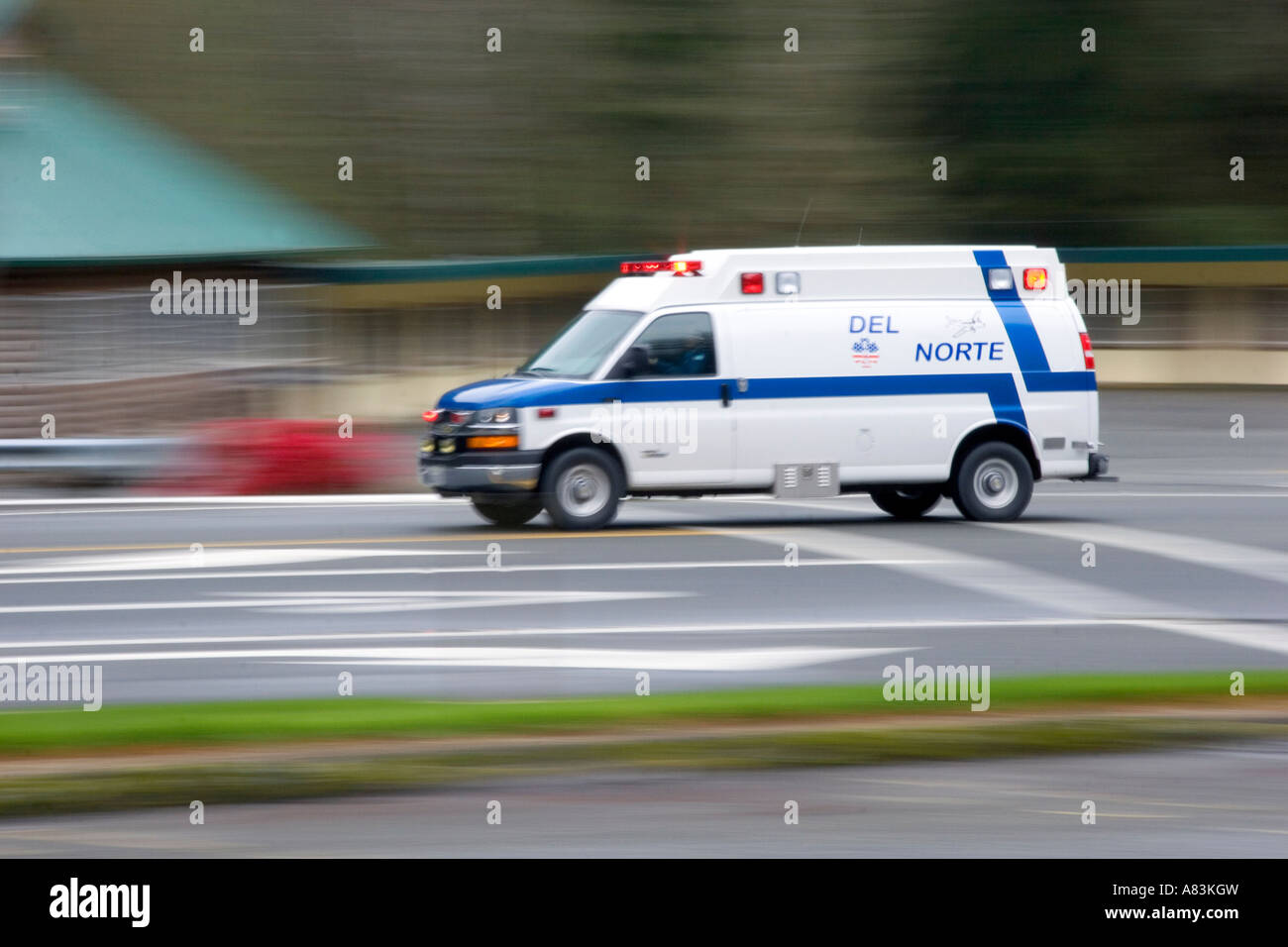 Ambulance in motion Stock Photo - Alamy