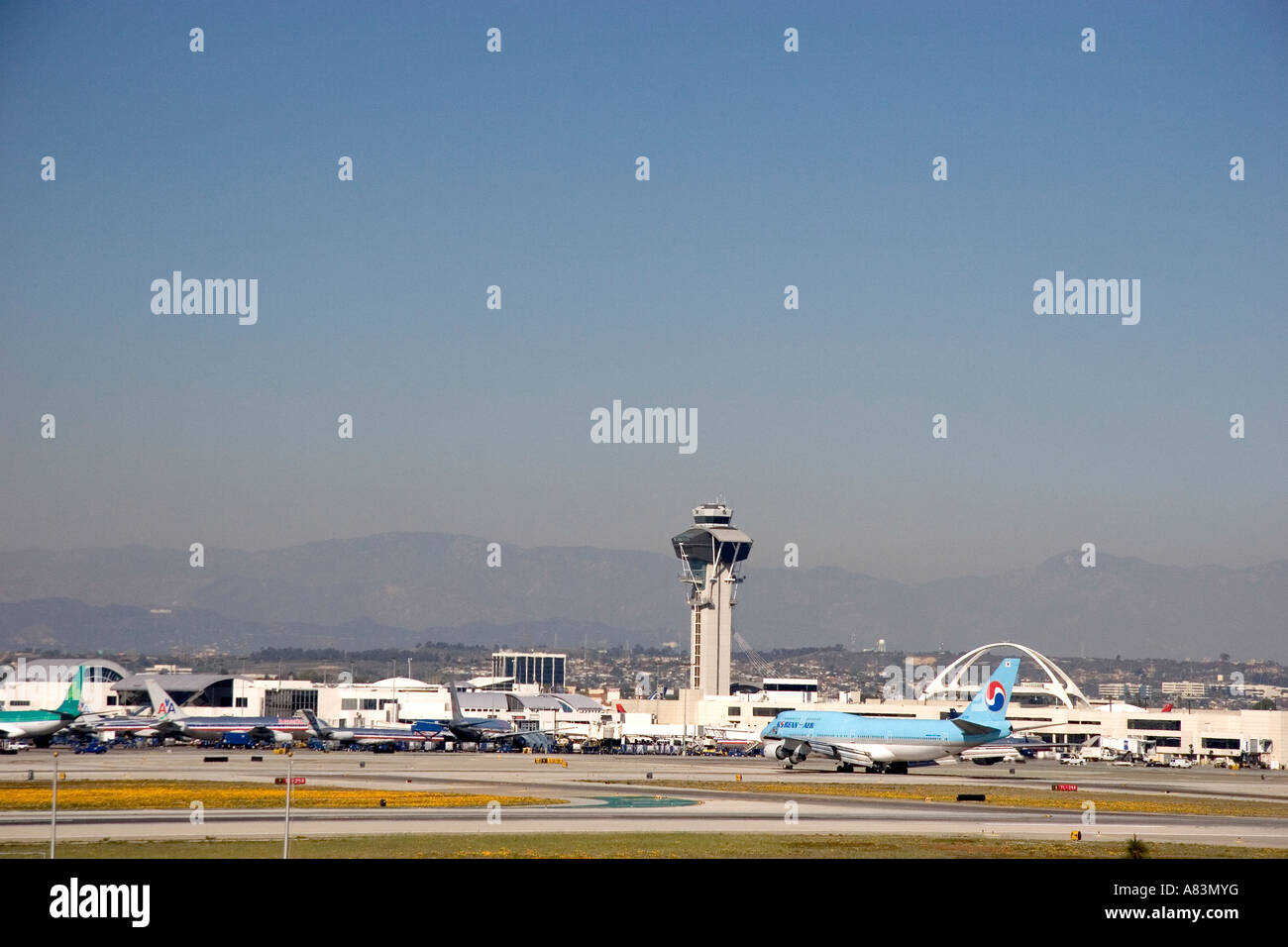 Airport terminal and control tower at LAX in Los Angeles California ...