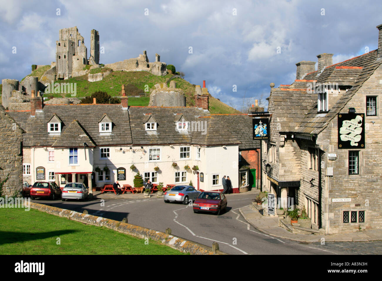 village of corfe with corfe castle ruins national trust property beyond ...