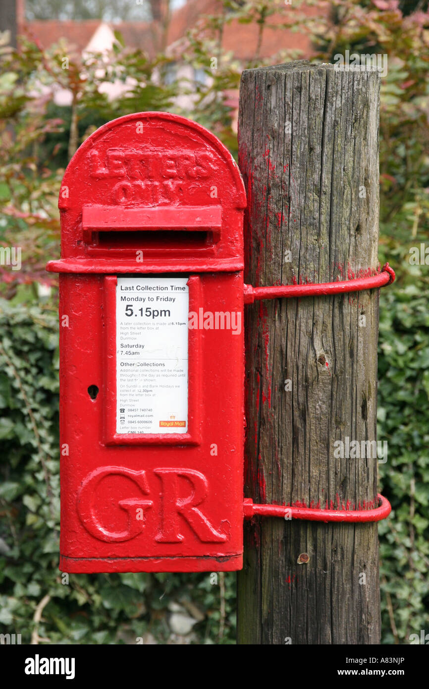 traditional gb red post box fixed to telegraph pole stump england uk gb ...