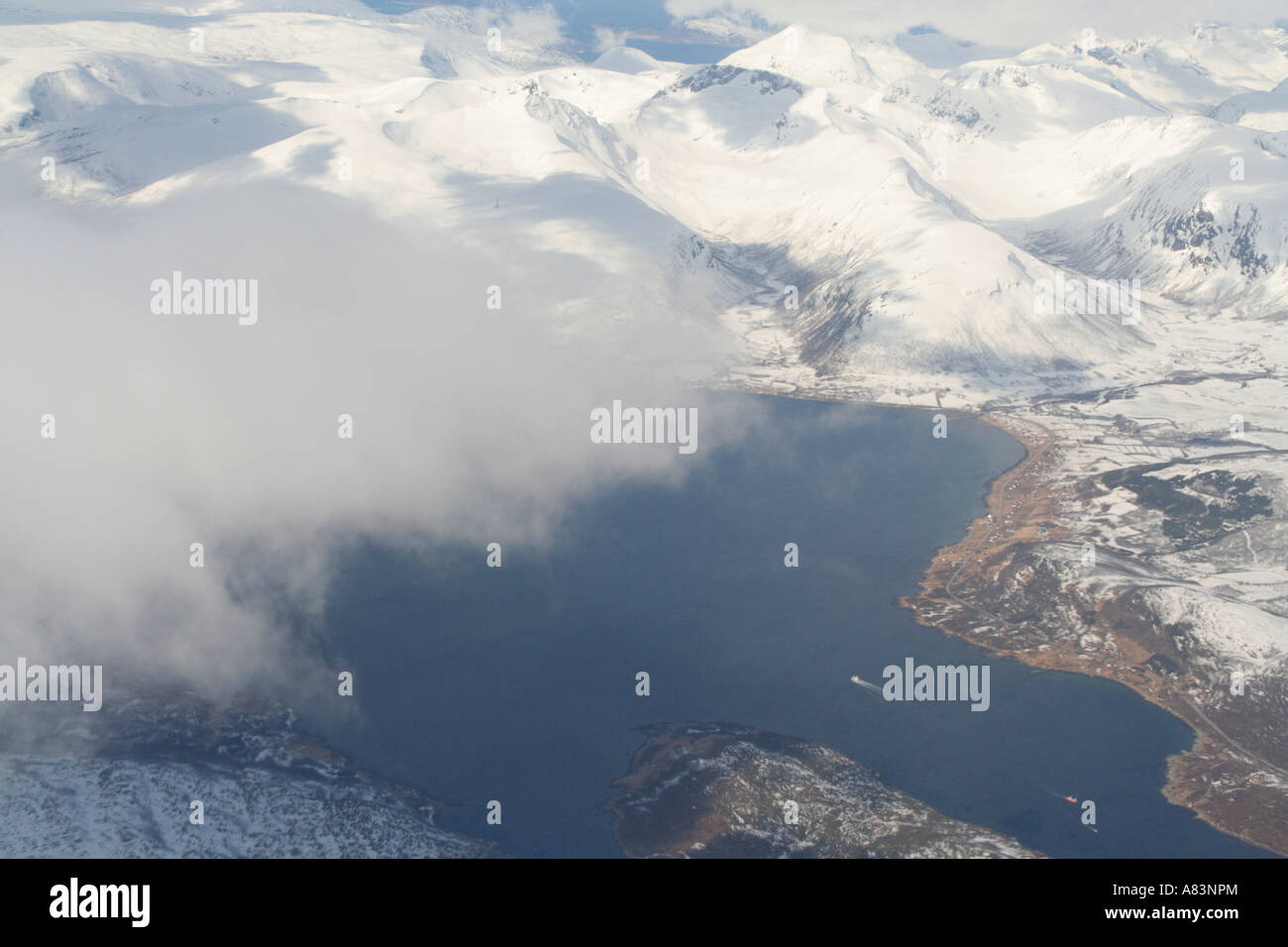 aerial view from plane norway arctic circle mountains snow covered ...