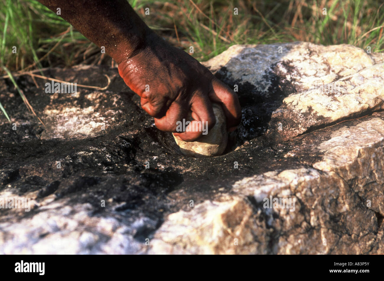 Ancient grinding stone Stock Photo - Alamy