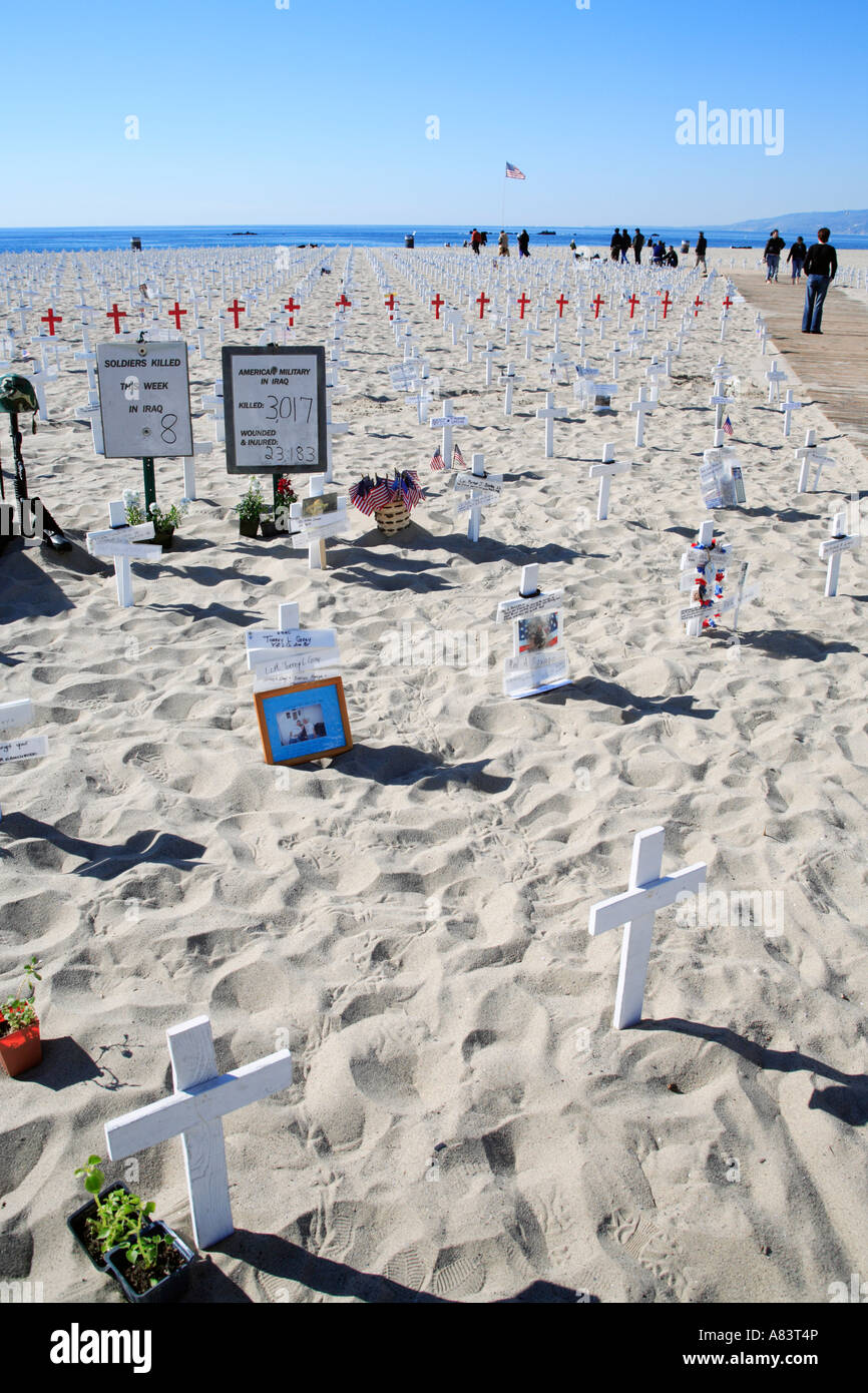 symbolic demonstration with grave crosses against iraq war at beach ...