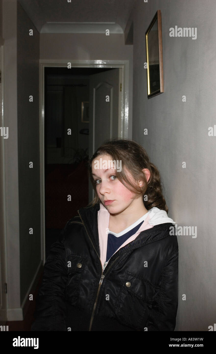 Portrait of girl standing in hallway Stock Photo - Alamy
