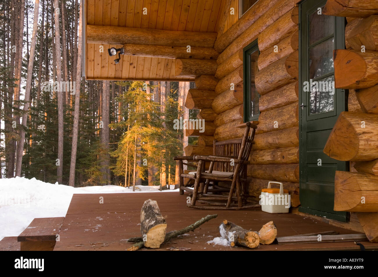 Log cabin porch with log furniture Stock Photo - Alamy