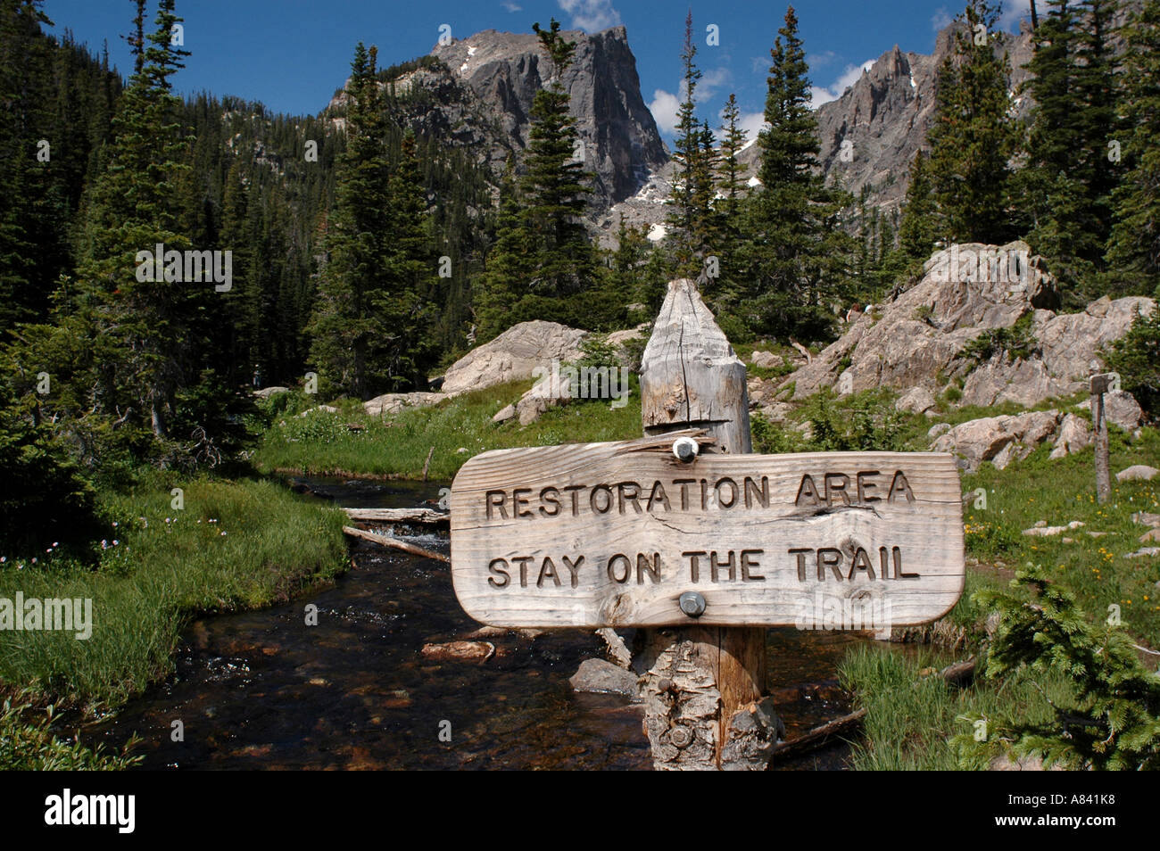 Restoration area stay on the trail sign Stock Photo - Alamy