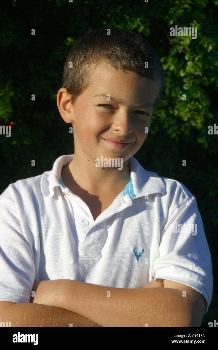 Young boy smiling confident Stock Photo - Alamy