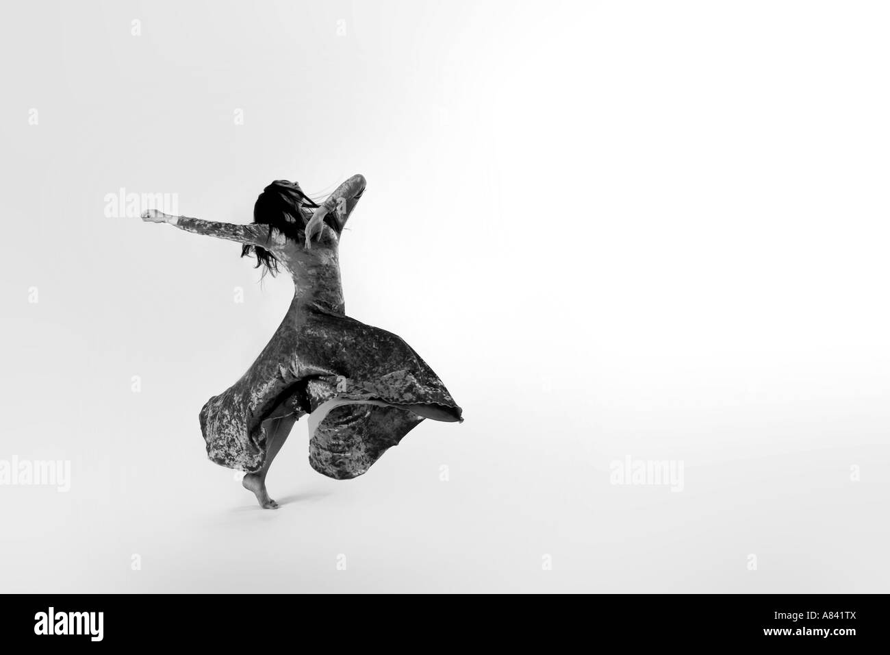 Freedom in dance - moving into the light Stock Photo - Alamy