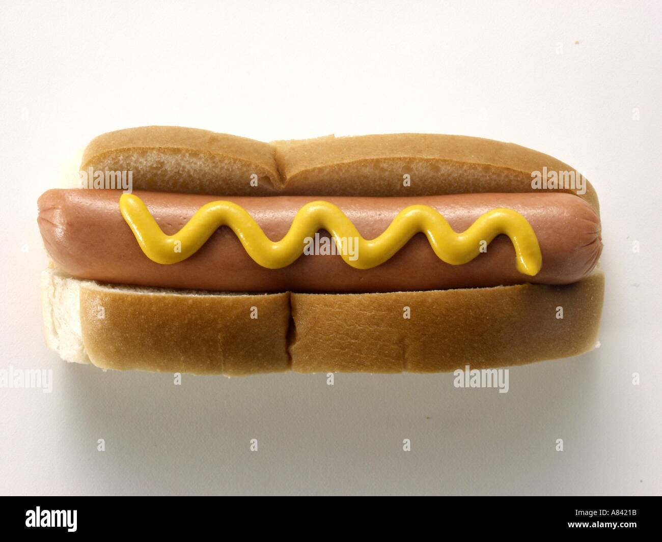 A Hot Dog with Yellow Mustard Stock Photo - Alamy