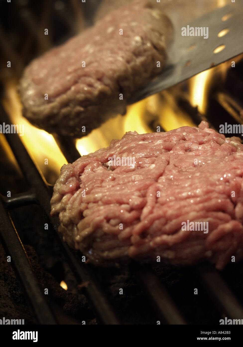 Flipping hamburger hi-res stock photography and images - Alamy