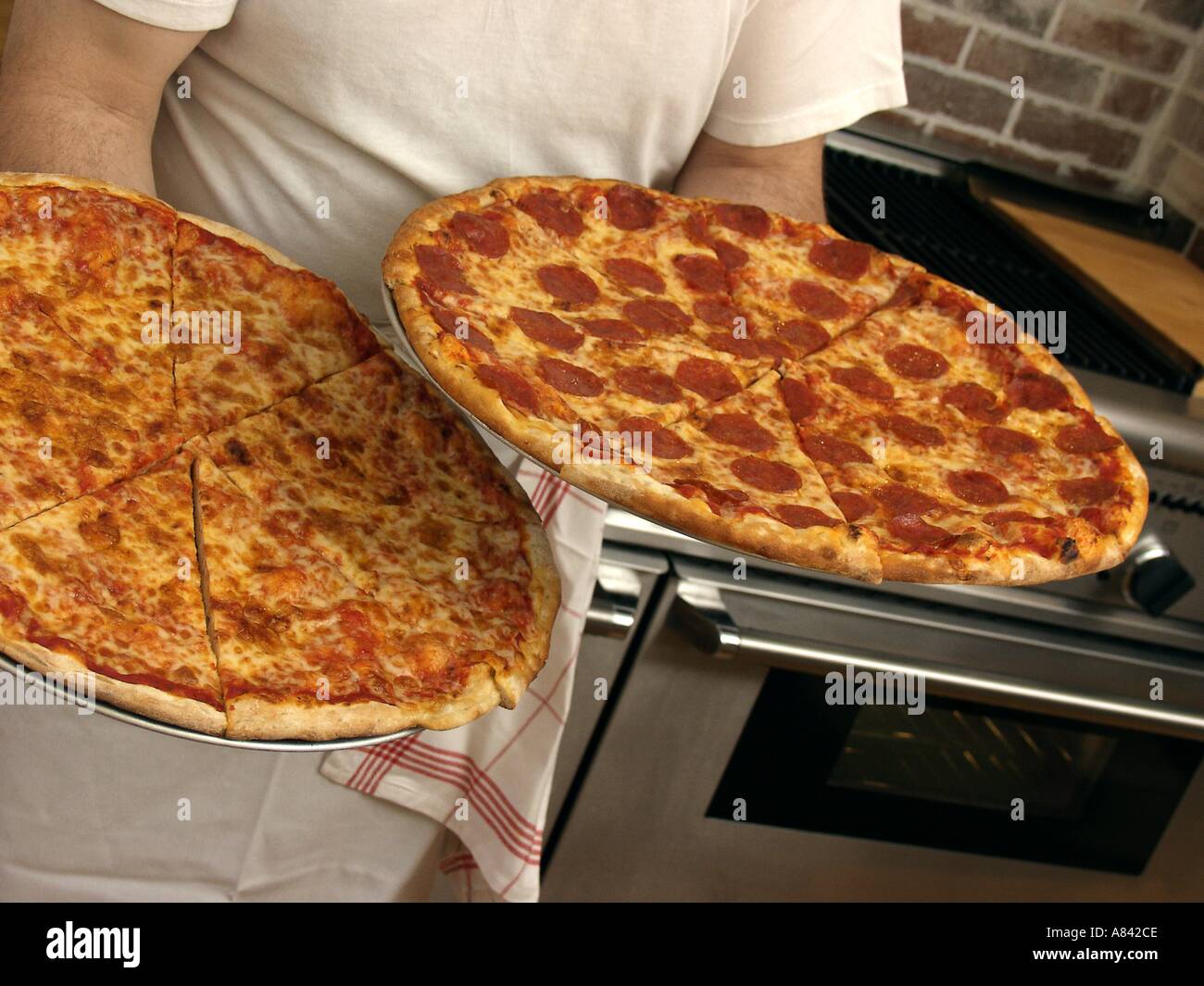 Two whole pizzas hi-res stock photography and images - Alamy