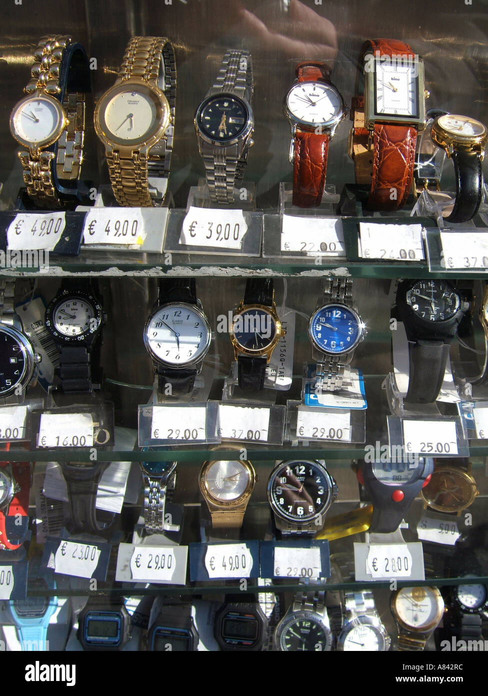 watches in shop window display Stock Photo - Alamy