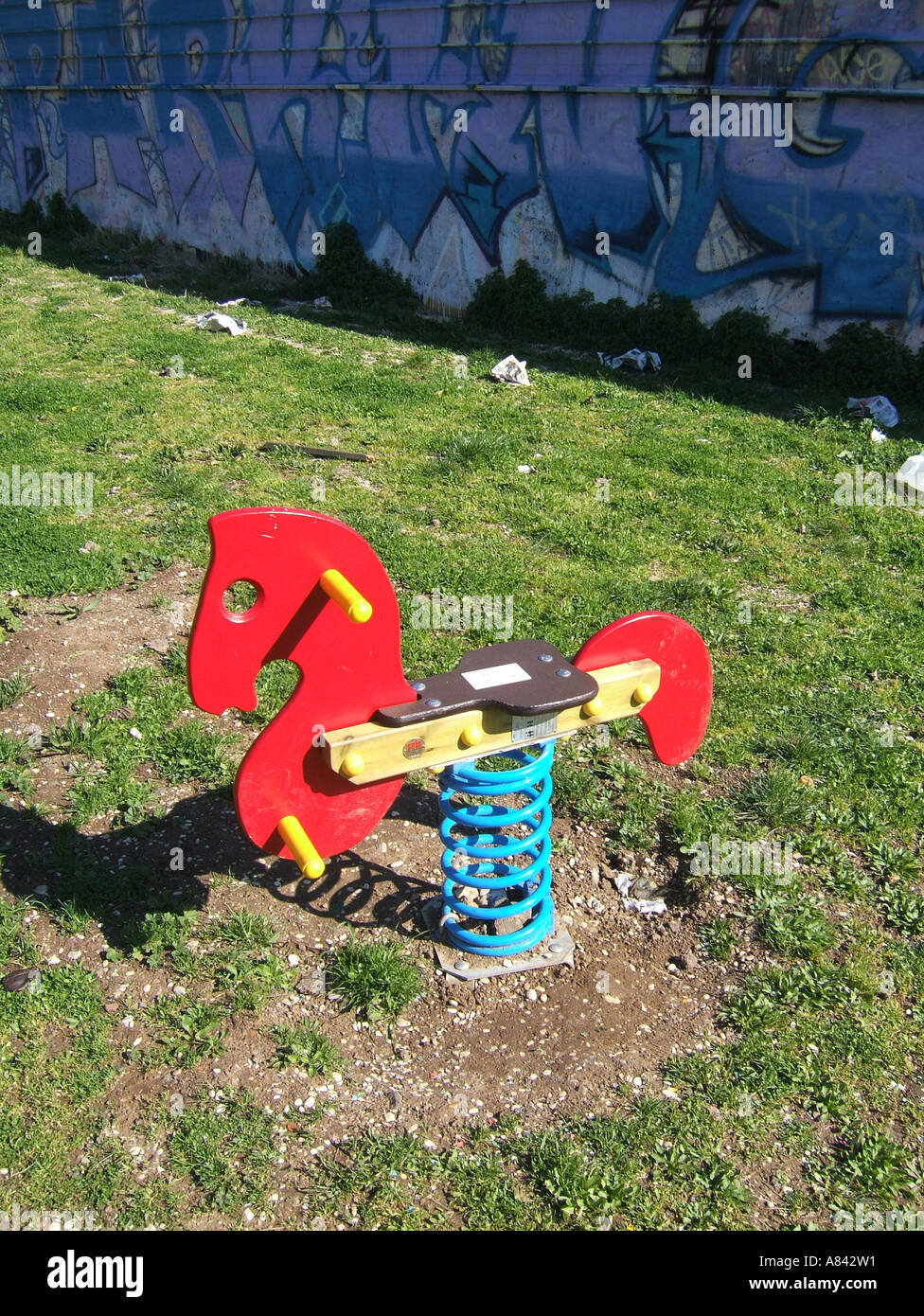 ride in run down urban decay playground Stock Photo - Alamy