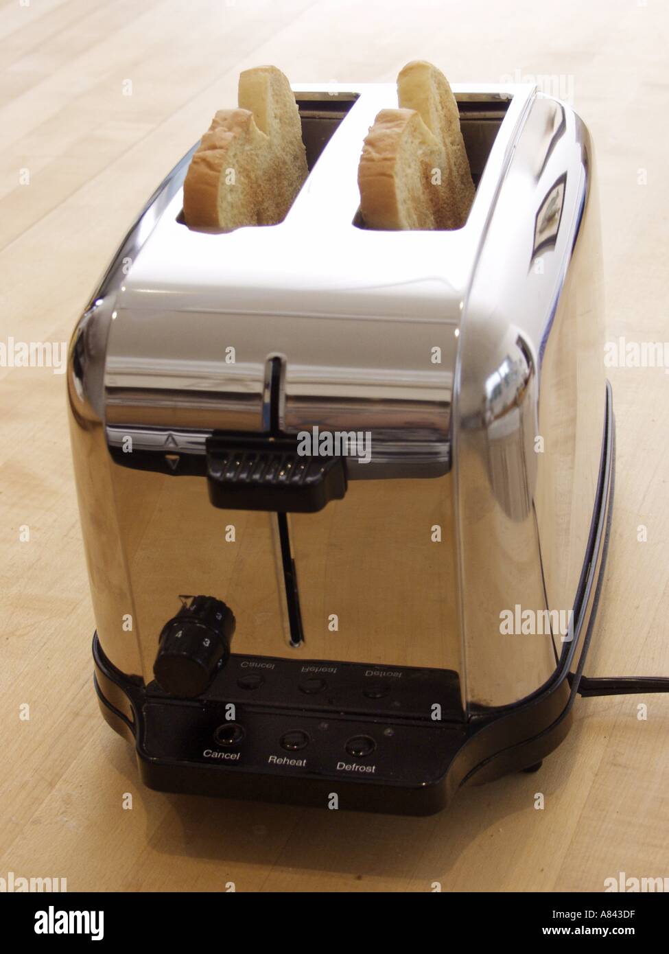 Two Slices of White Toast in a Toaster Stock Photo - Alamy