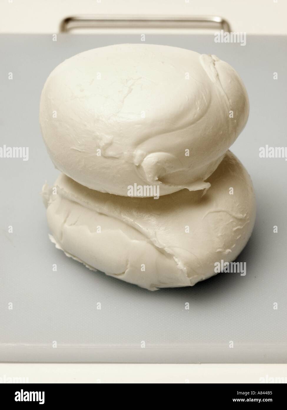 Two Balls of Mozzarella Cheese Stock Photo - Alamy