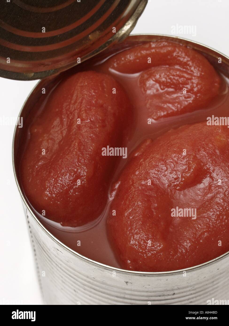 Opened Can of Tomatoes Stock Photo - Alamy