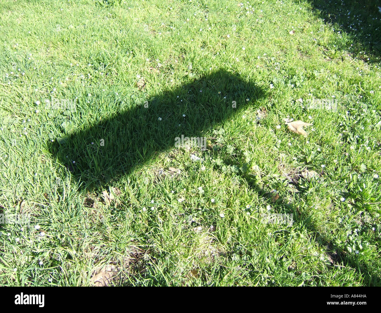 sign shadow in grass Stock Photo - Alamy
